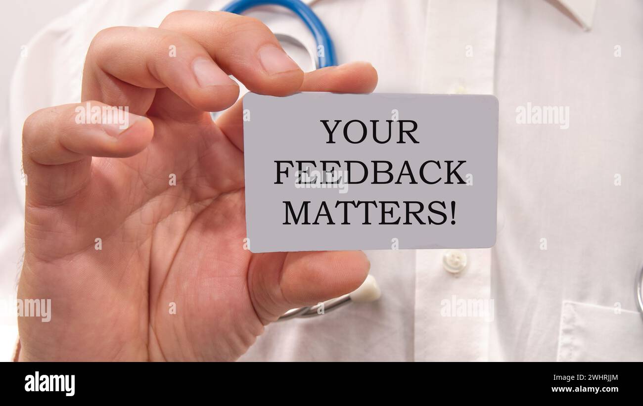 Your Feedback Matters written on a white card in the hands of a ...