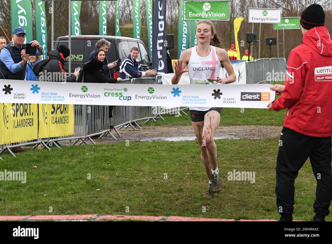 Britain's athlete Jessica Gibbon celebrates as she crosses the finish ...