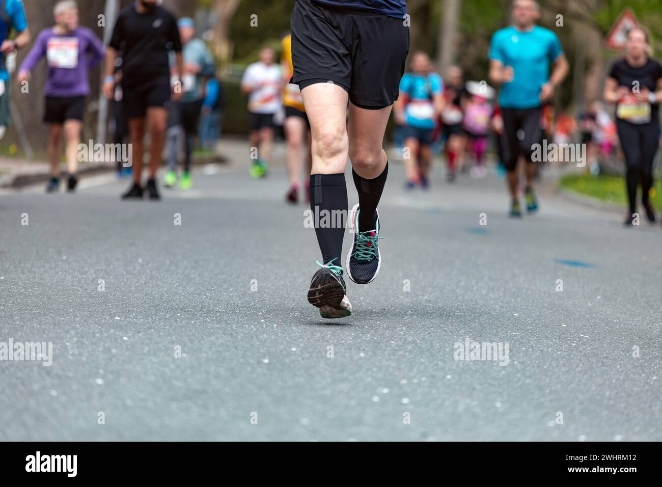 Legs marathon runners on road hi-res stock photography and images - Alamy