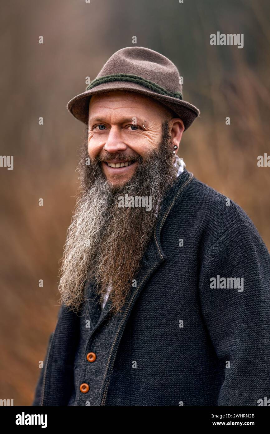 Portrait of a bavarian man wearing a traditional folk costume outdoors ...