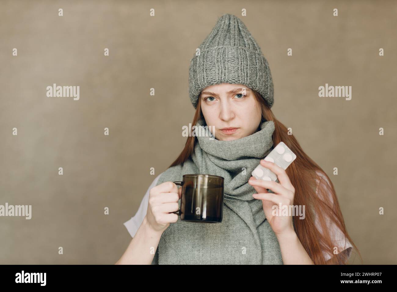 Young woman has flu catarrh ill sick disease treatment cold hold ...