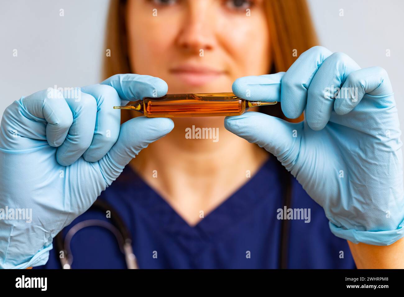 Medical Professional Examining Amber Ampoule Stock Photo - Alamy