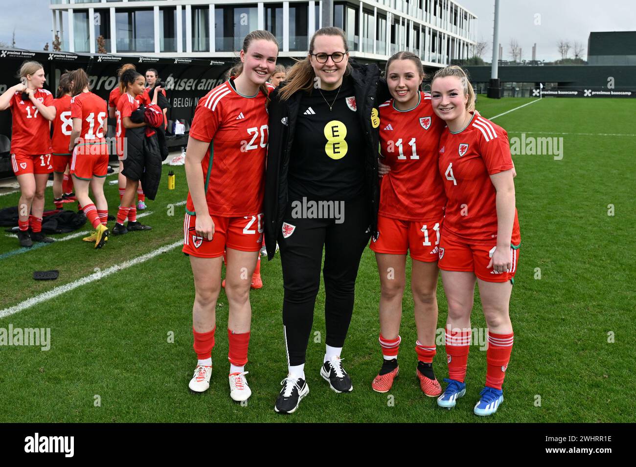 Ania Denham (20) of Wales, a staff member , Mared Griffiths (11) of ...