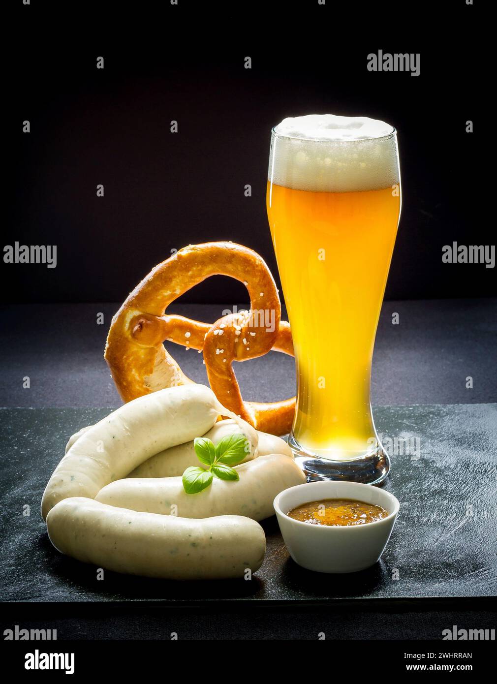 Original Munich sausage with Hefeweizen and pretzel Stock Photo - Alamy