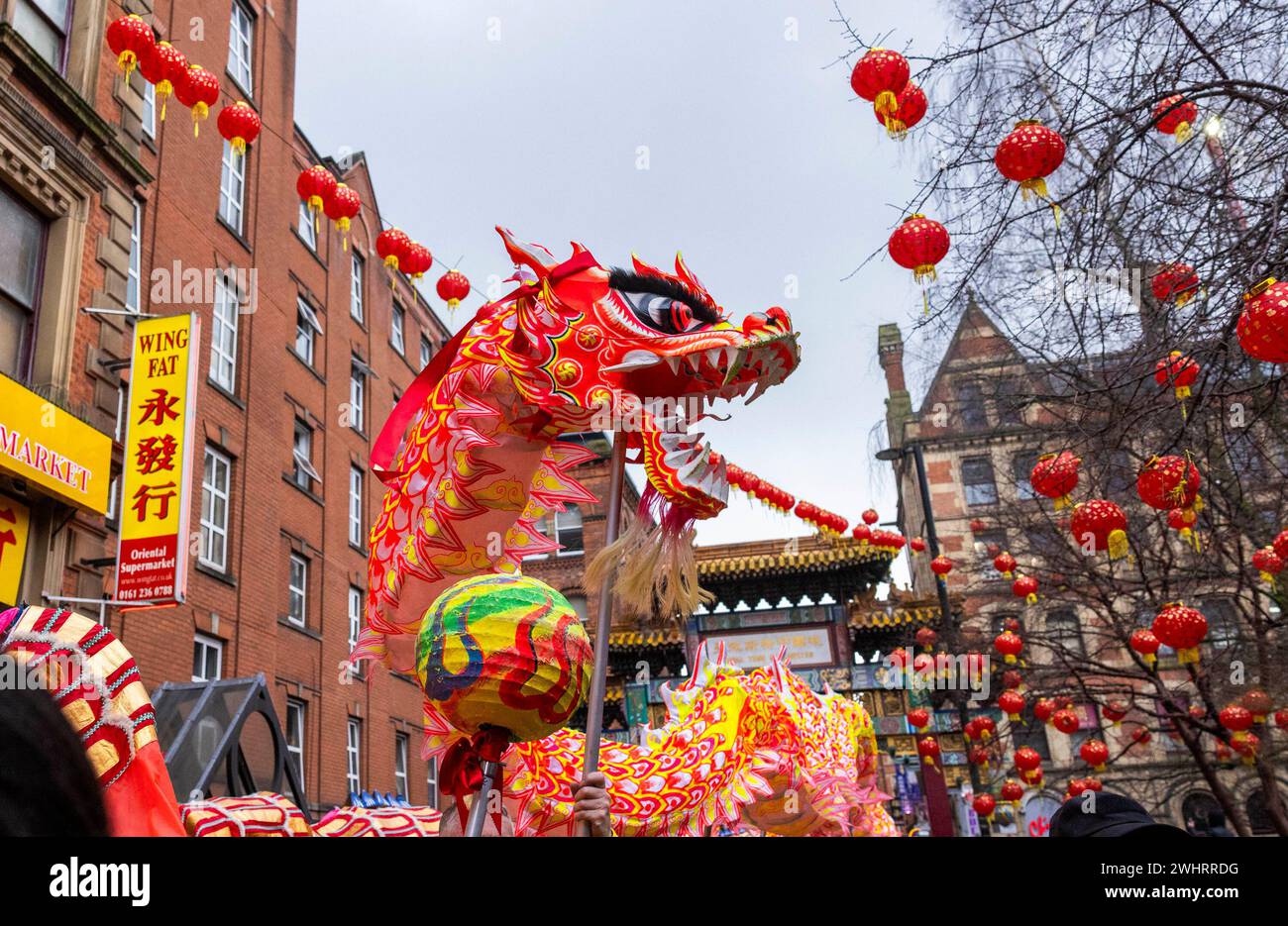 EDITORIAL USE ONLY Performers Manchester's China Town, take part in the ...