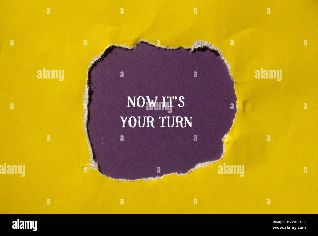 Now Its Your Turn Words Written On Torn Yellow Paper With Purple