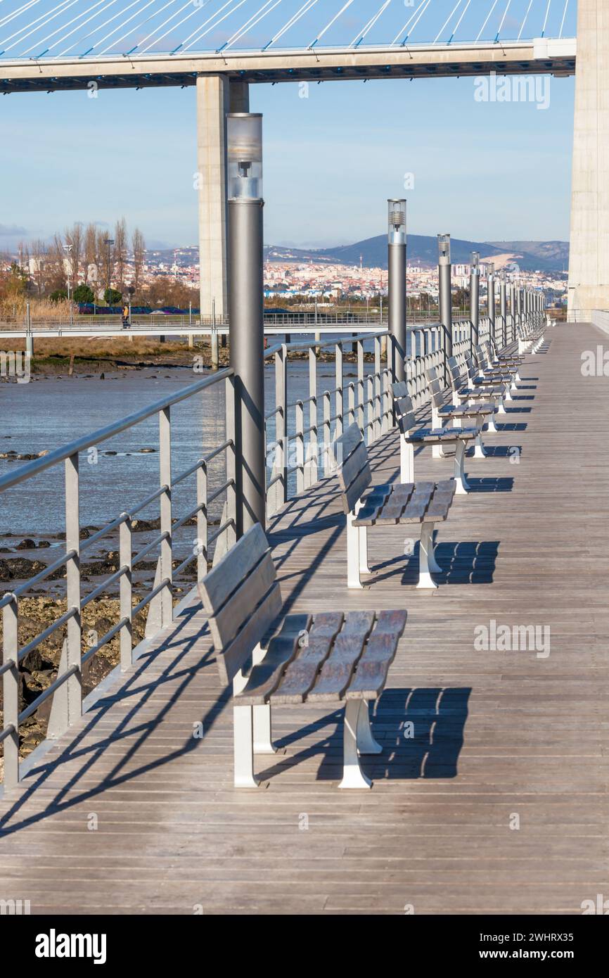 Wooden Benches Row at River Embankment Stock Photo - Alamy