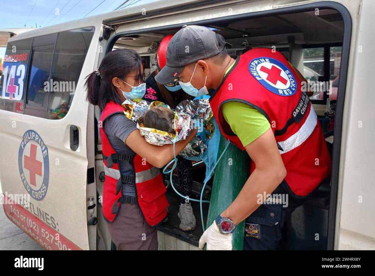 In this Feb. 9, 2024 handout photo provided by the Philippine Red Cross ...