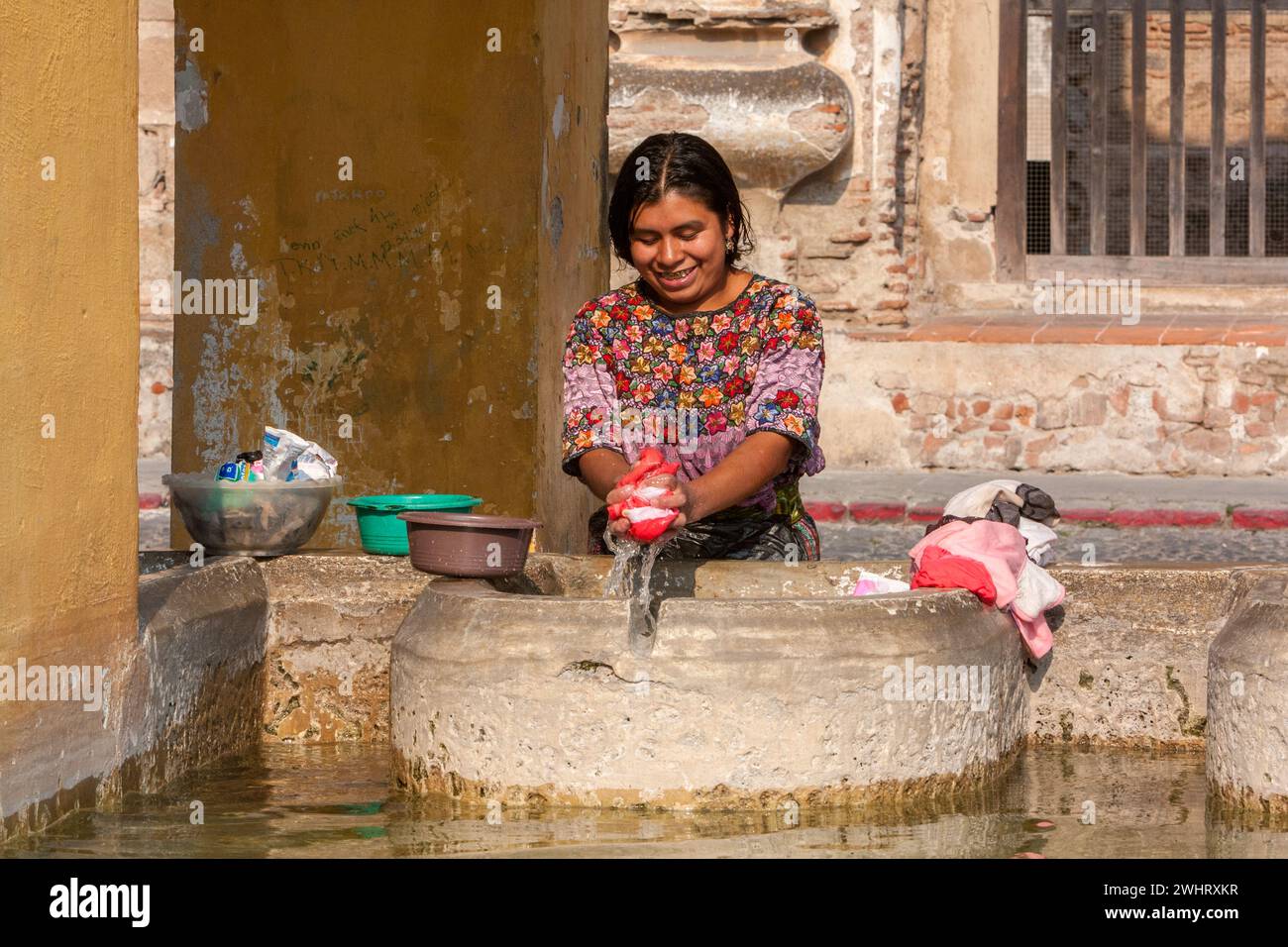 Antigua, Guatemala. Woman Doing Laundry at the Public Pila, or Washing ...
