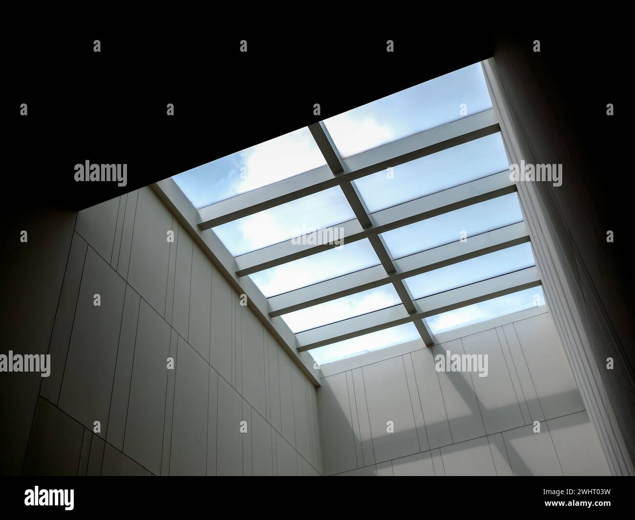 Ant eyes view of ceiling window glass roof decorating the modern ...