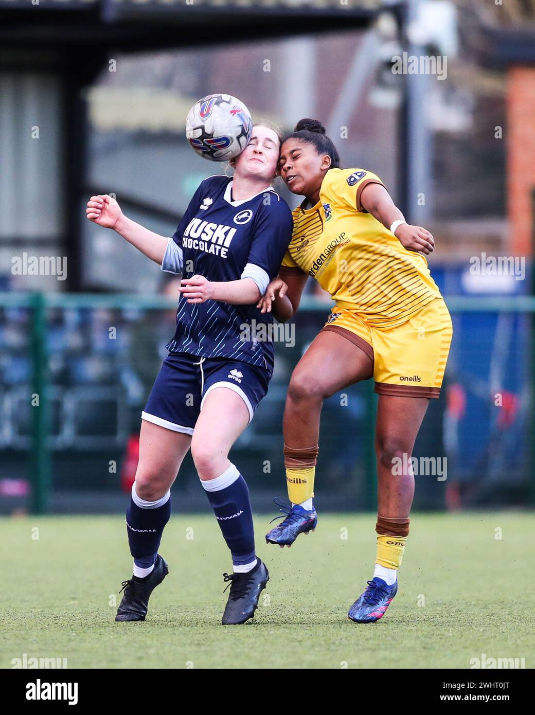 Millwall Lionesses' Ciara Wakling (left) Sutton United Women's Justine ...