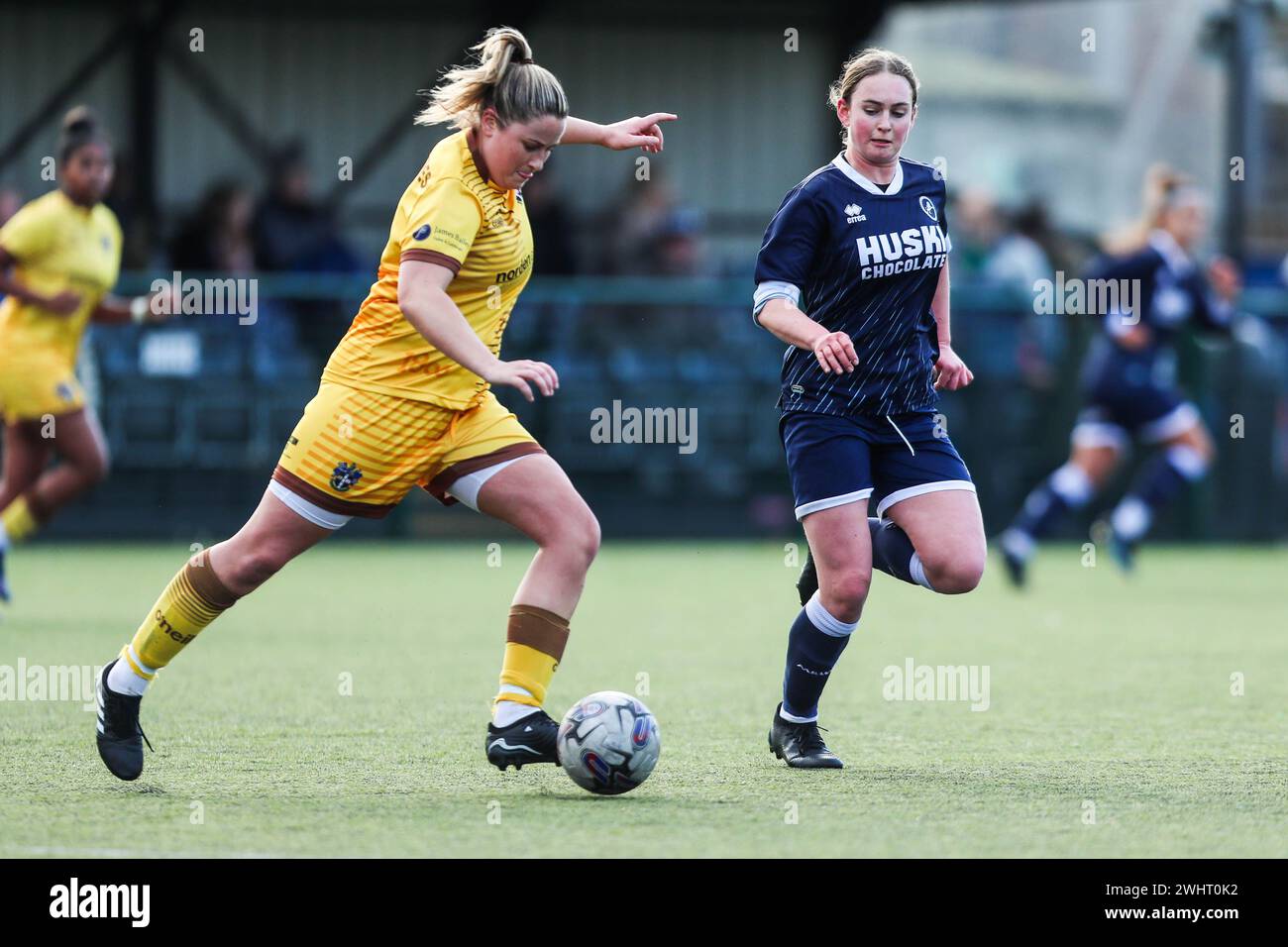 Sutton United Women's Abbie Measures (left) and Millwall Lionesses ...