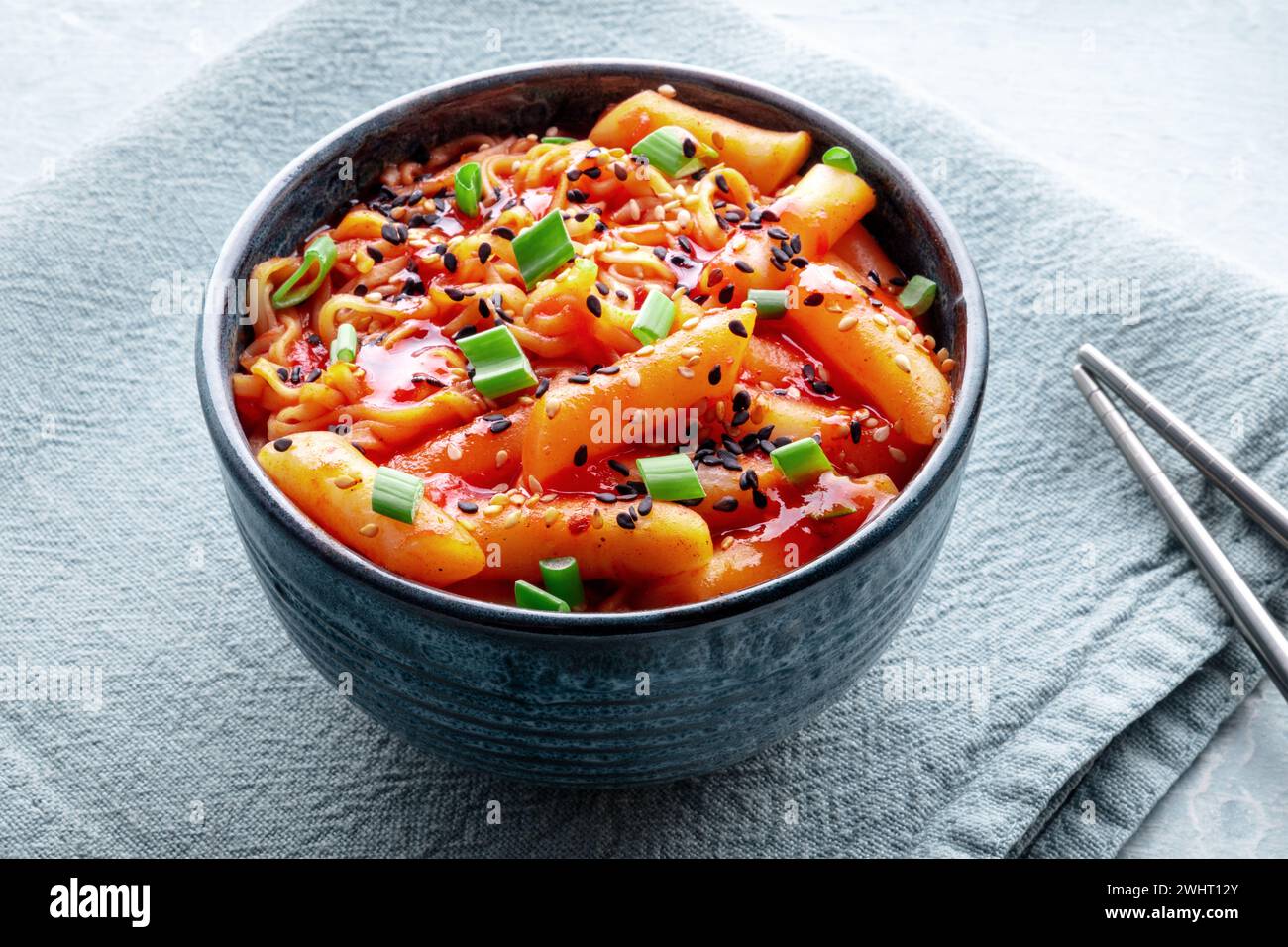 Rabokki, tteokbokki or topokki with ramen, Korean street food, spicy ...