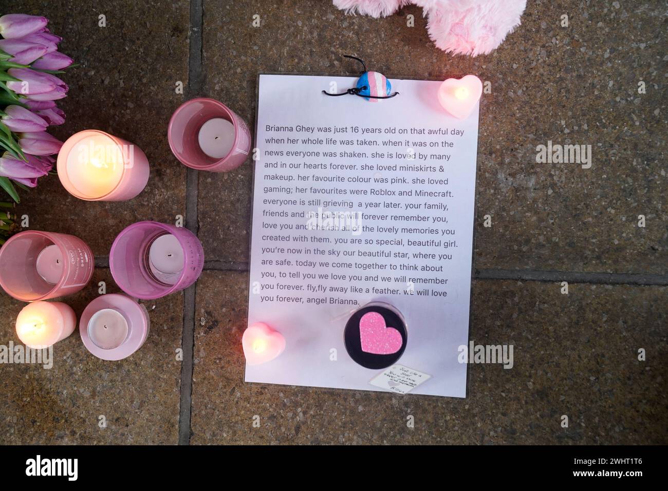 Flowers, candles and a note left during a vigil for murdered 16-year ...