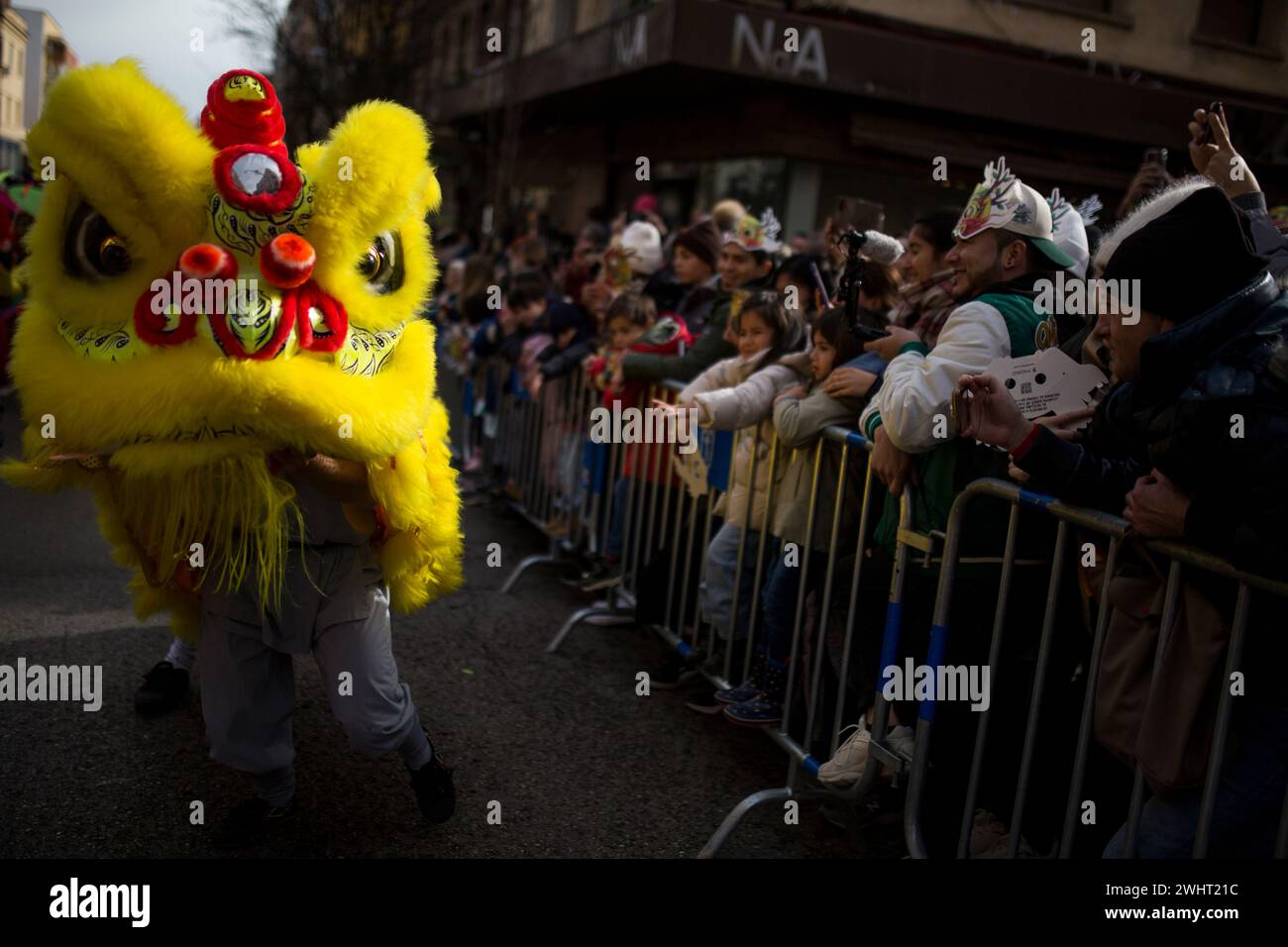 Madrid, Madrid, Spain. 11th Feb, 2024. Chinese lion dancers approach ...