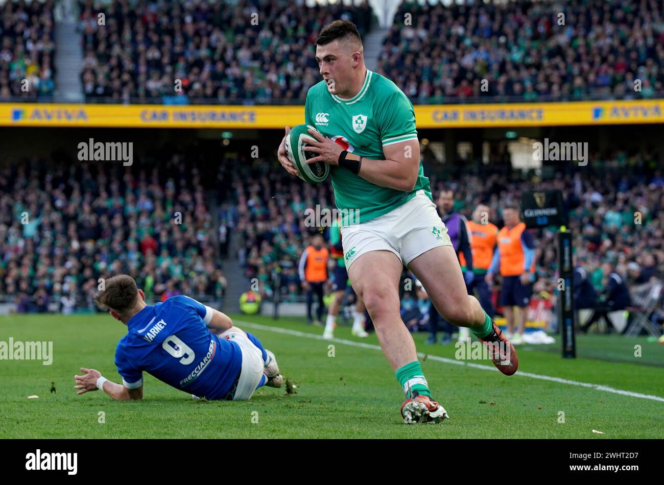 Ireland's Dan Sheehan (right) runs in to score his side second try of ...