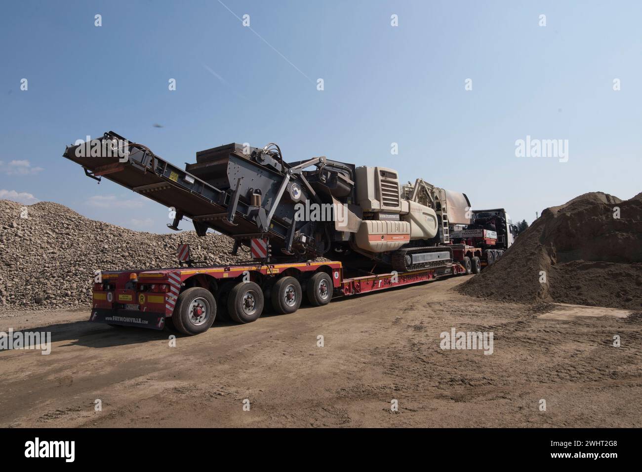 Heavy Load Transport On The Road Transportation Of Heavy Goods Stock Heavy Load Transport On The Road Transportation Of Heavy Goods Stock