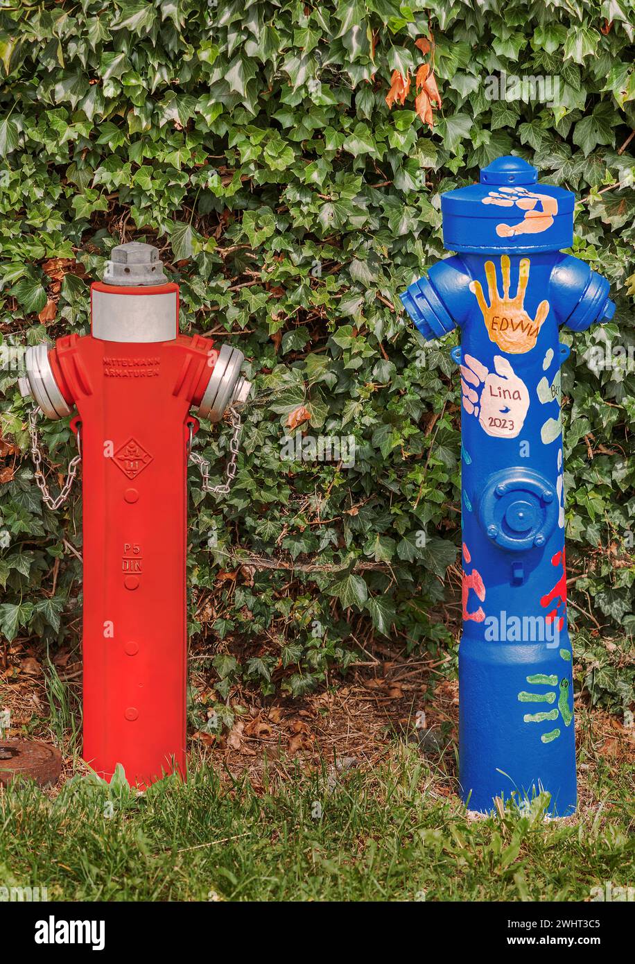 The colored hydrants Stock Photo - Alamy