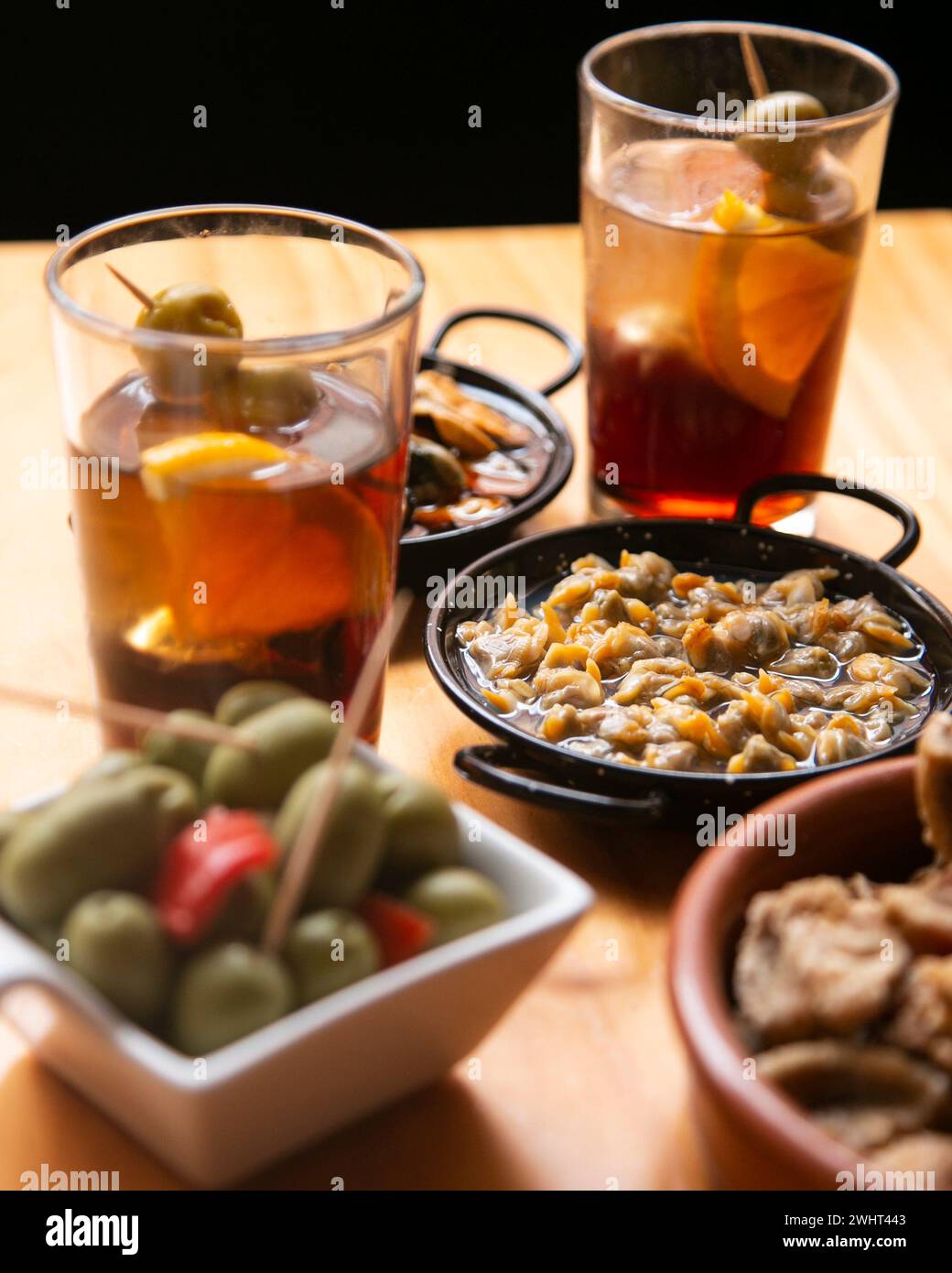 Table with Spanish tapas and vermouth at noon in a bar in Barcelona ...