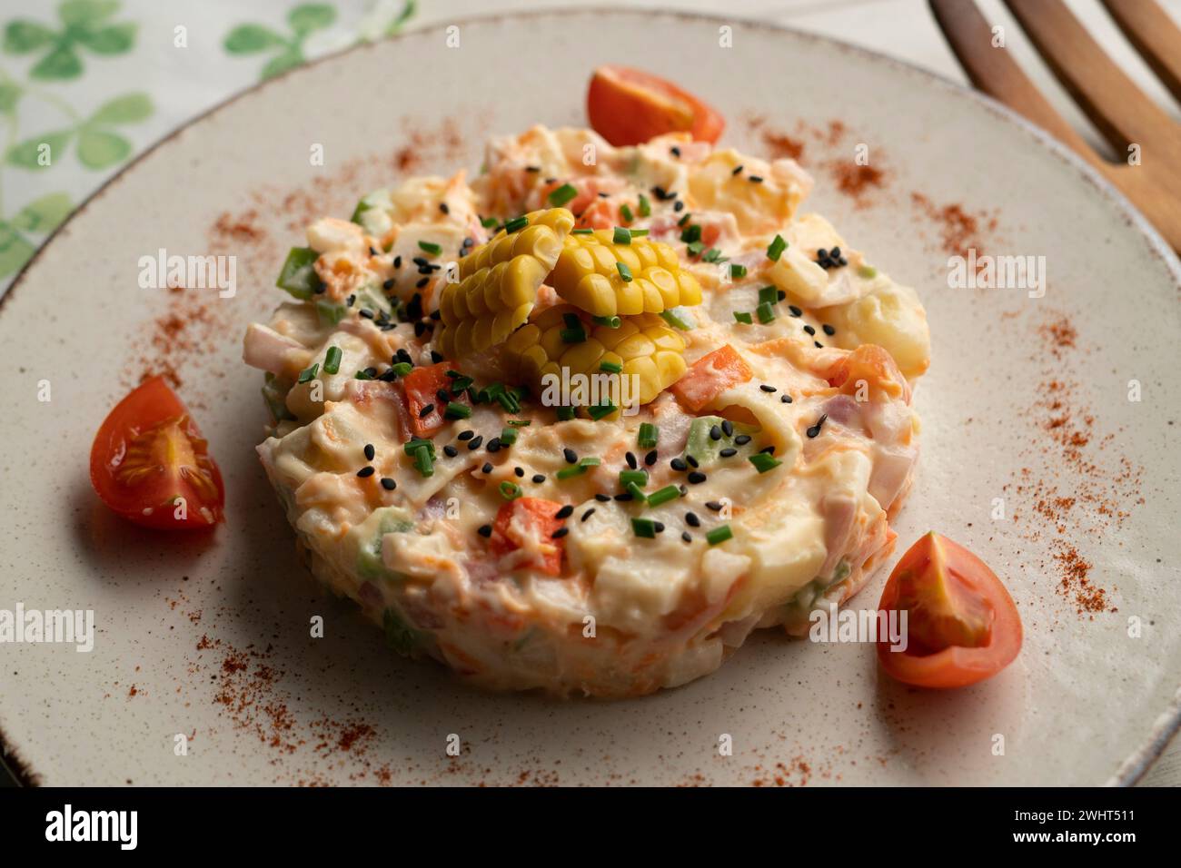 Traditional Russian salad with mayonnaise and corn Stock Photo - Alamy