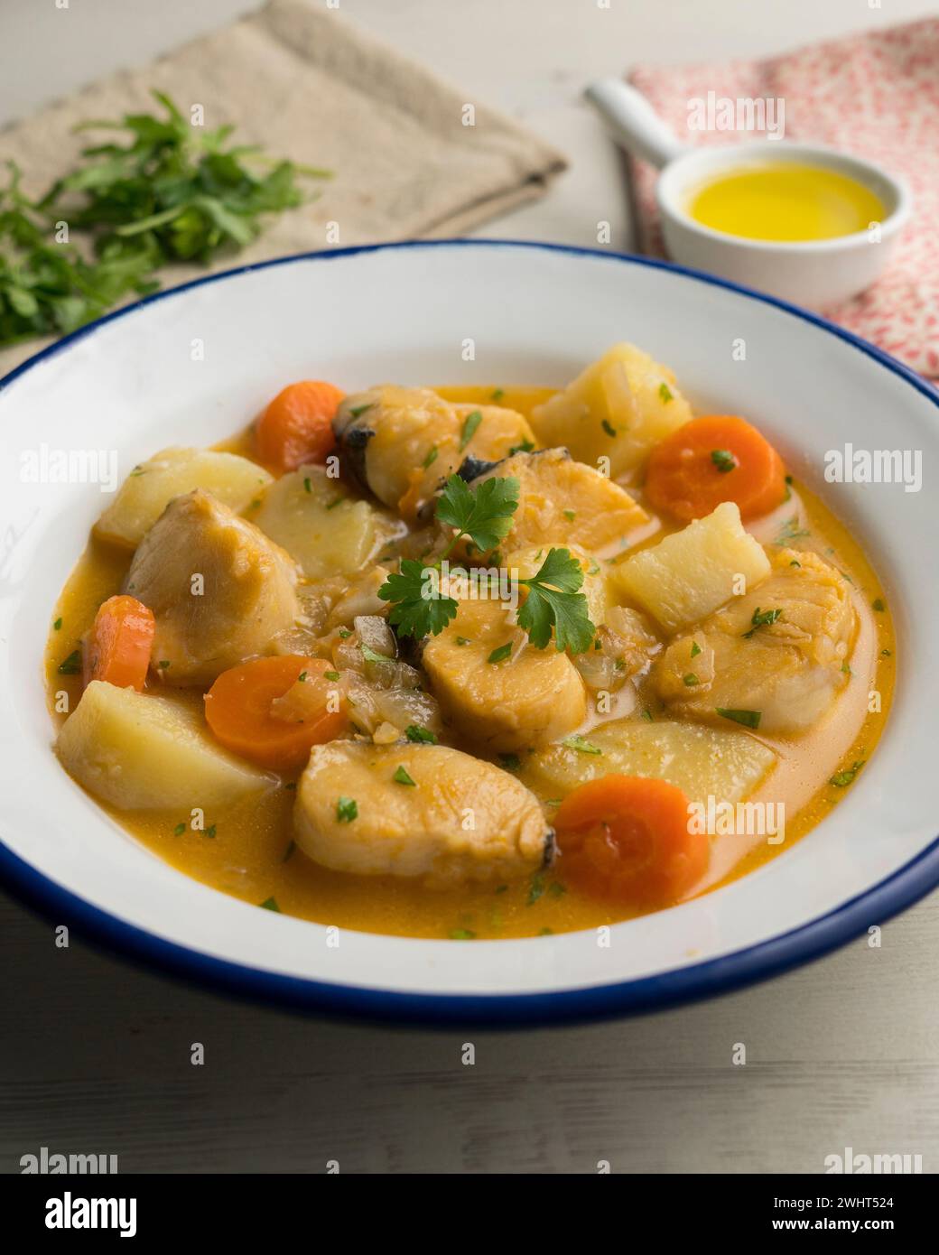 Hake stew with potatoes and carrots. Traditional Spanish recipe Stock ...