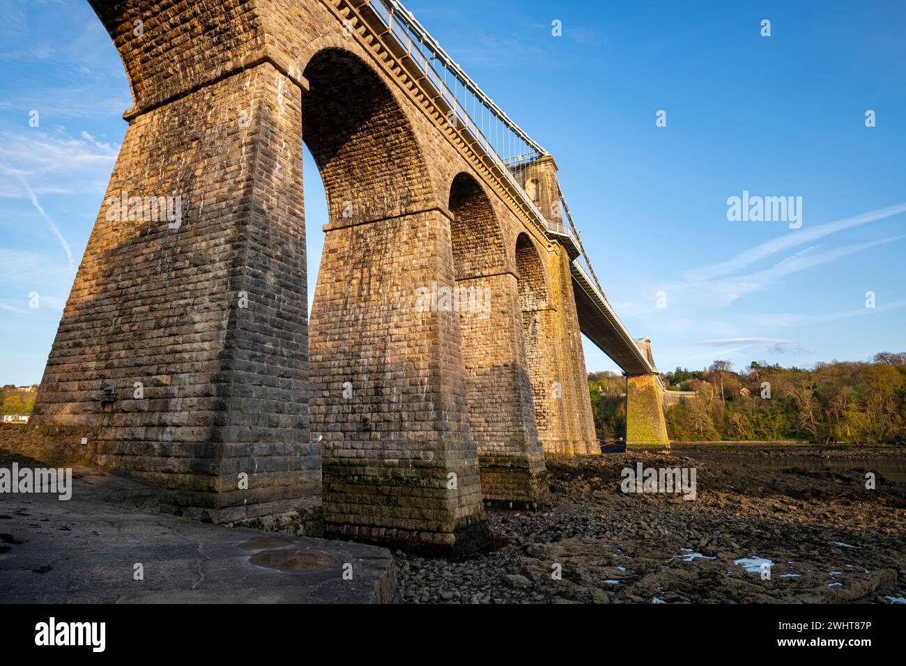 The Menai Suspension Bridge on the coast between Anglesey (Ynys Mon ...