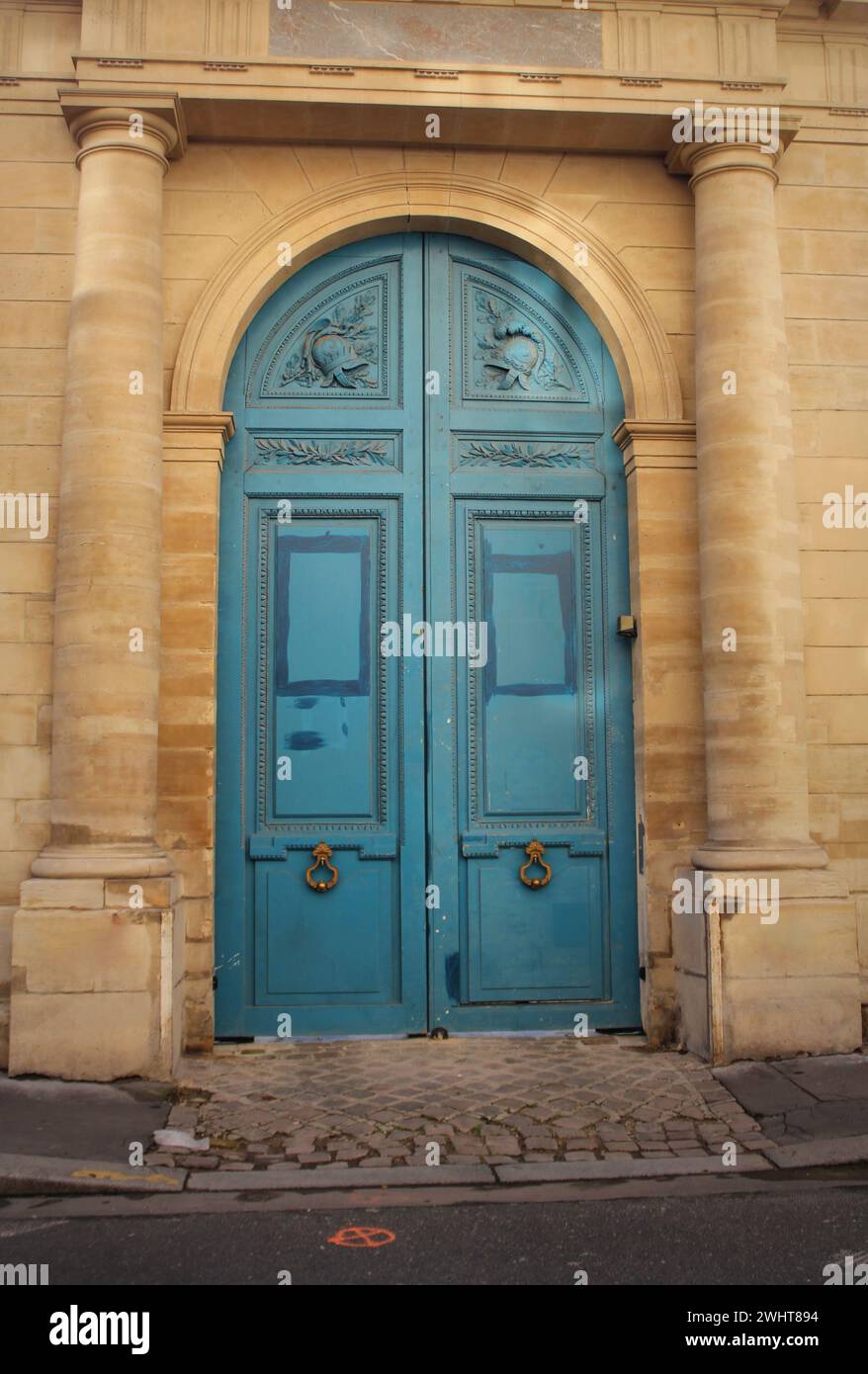 Old fashioned front door entrance, white facade and blue door, Paris ...