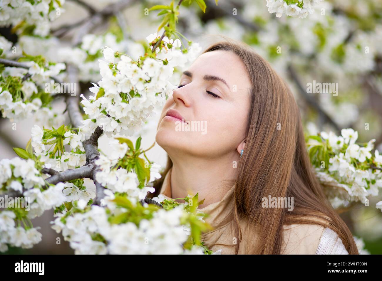 Woman enjoying spring nature hi-res stock photography and images - Alamy