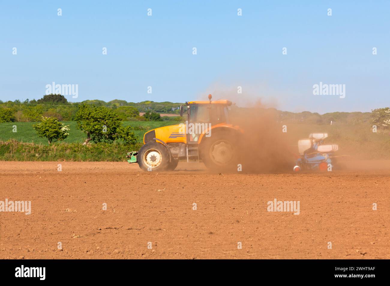 Agriculture - Tractor on the field Stock Photo - Alamy