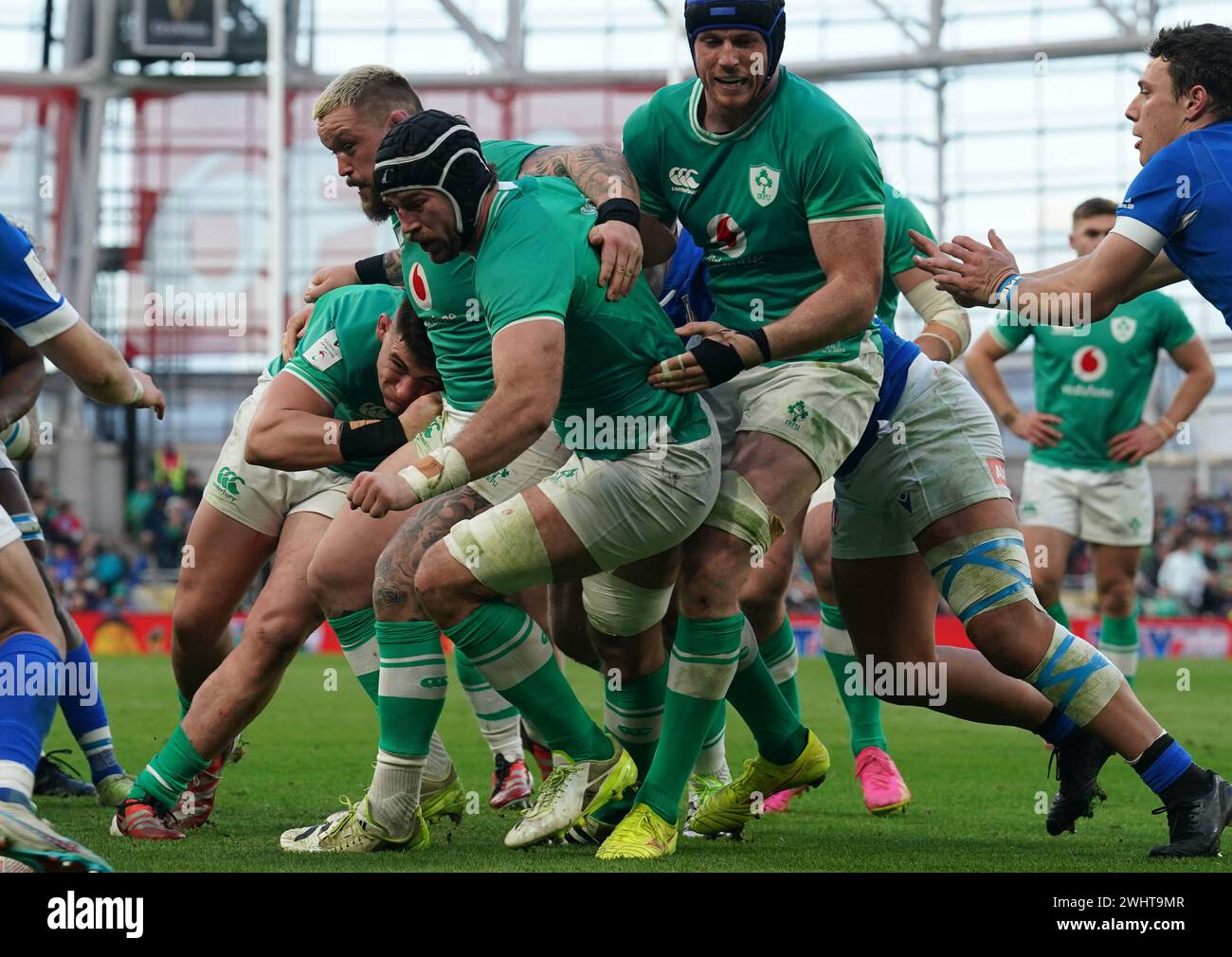 Ireland's Dan Sheehan (left) on his way to scoring his sides fourth try ...
