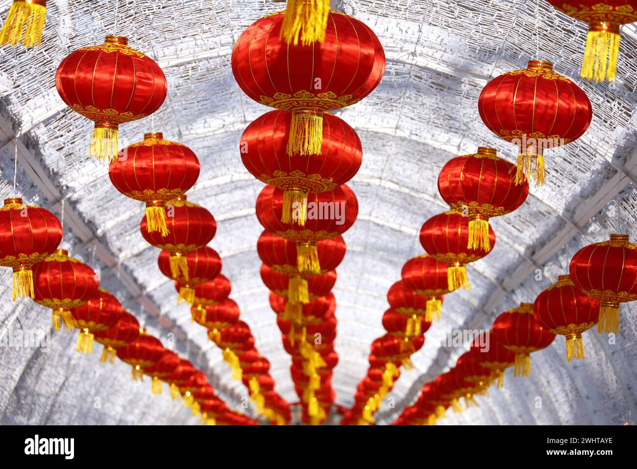 Red Chinese lanterns in a row on a street. New Year celebration in Asia Stock Photo - Alamy