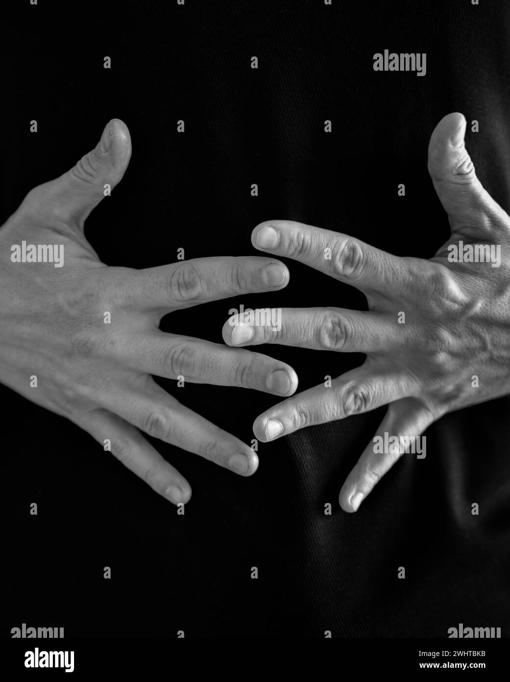 Intertwined hands hi-res stock photography and images - Alamy