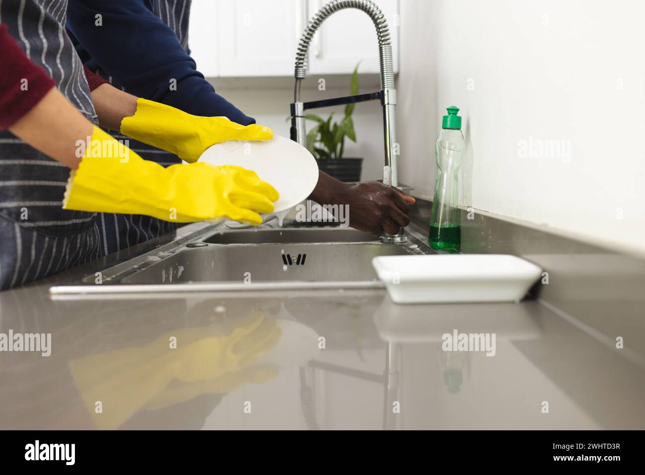 Happy diverse female couple doing hi-res stock photography and images ...