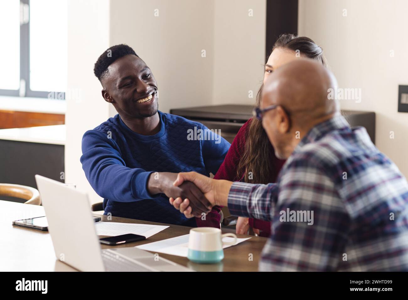 Diverse senior couple shaking hi-res stock photography and images - Alamy