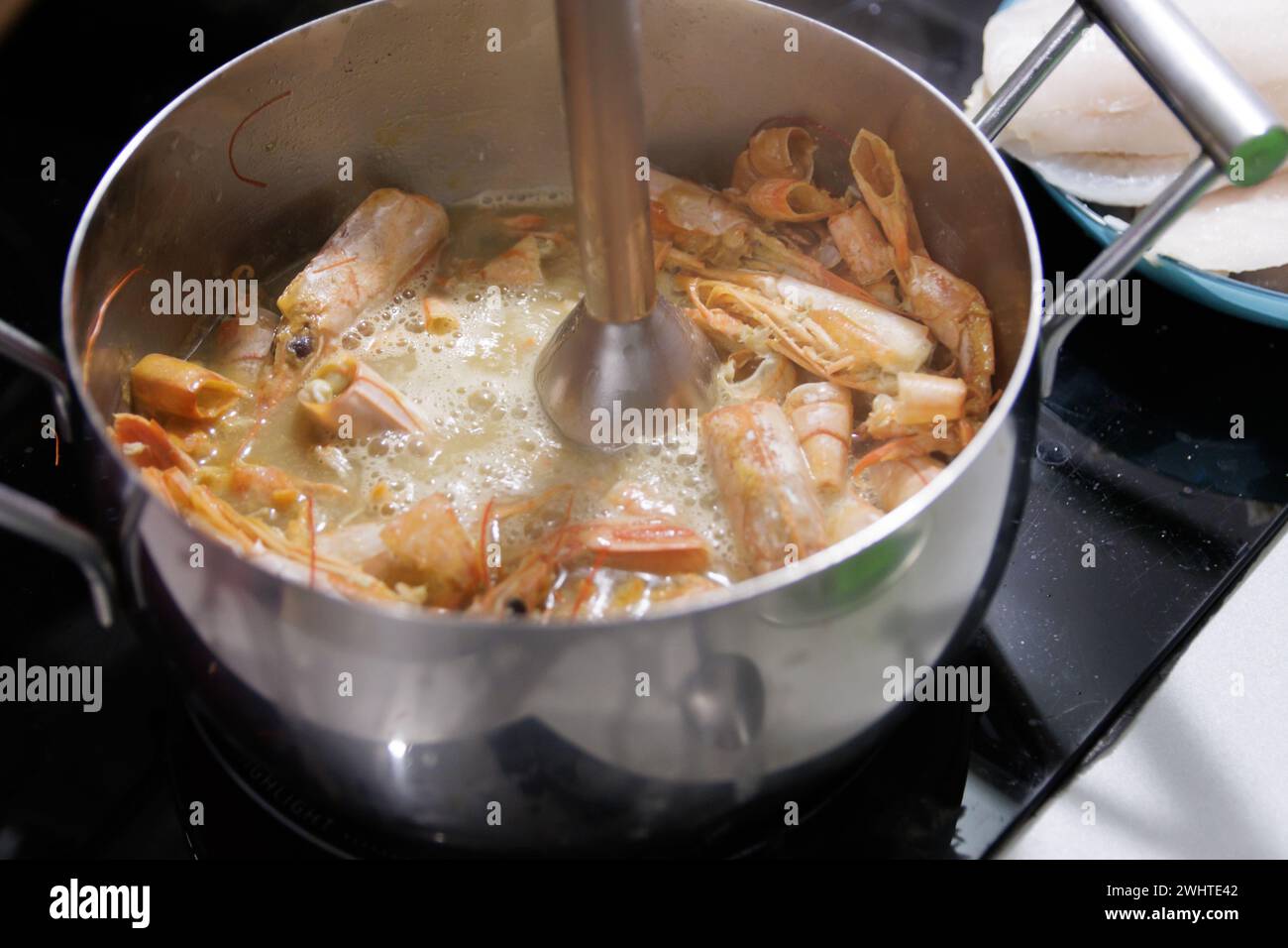 Fish in sauce with shrimp. Step by step preparation. Fumet with shrimp ...