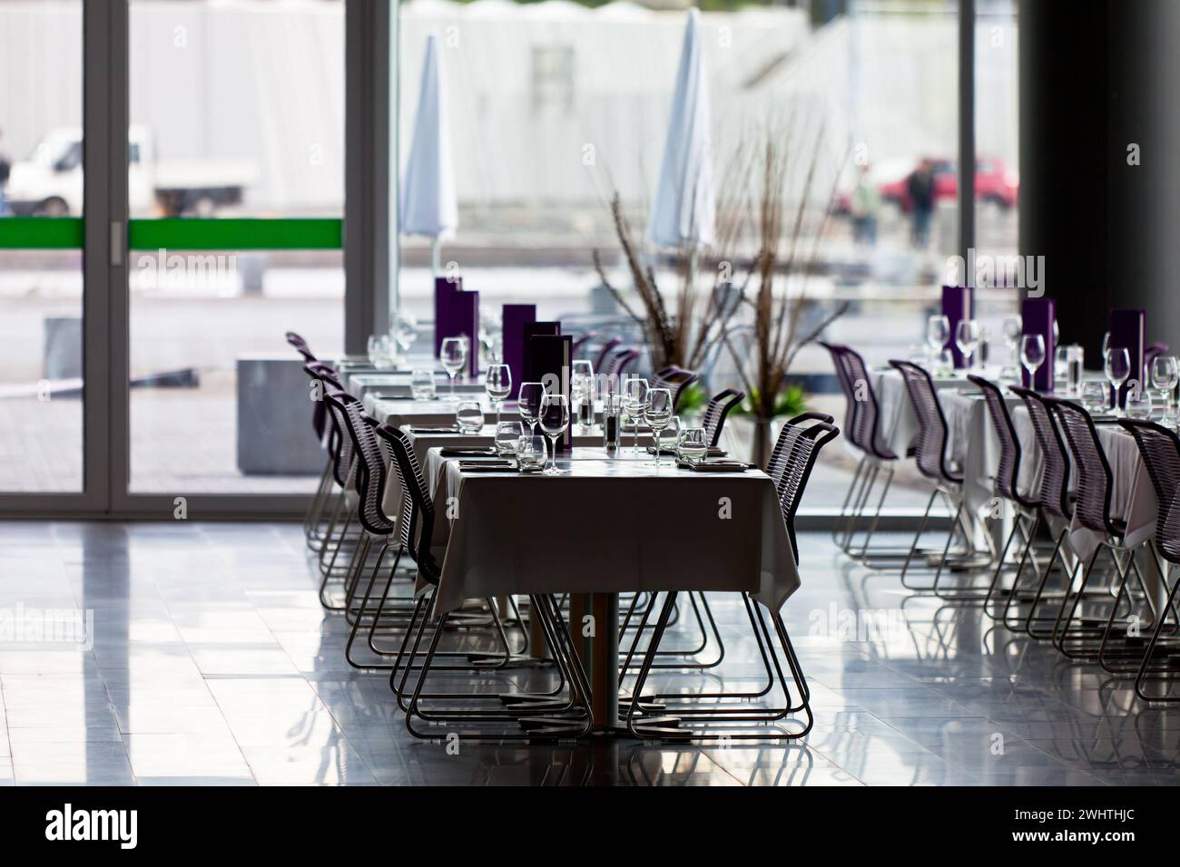 Indoor restaurant tables ready for service Stock Photo - Alamy