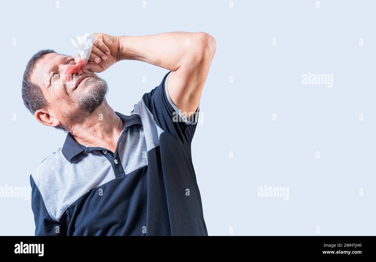 Senior man with irritated nose isolated. man with red nose cold ...