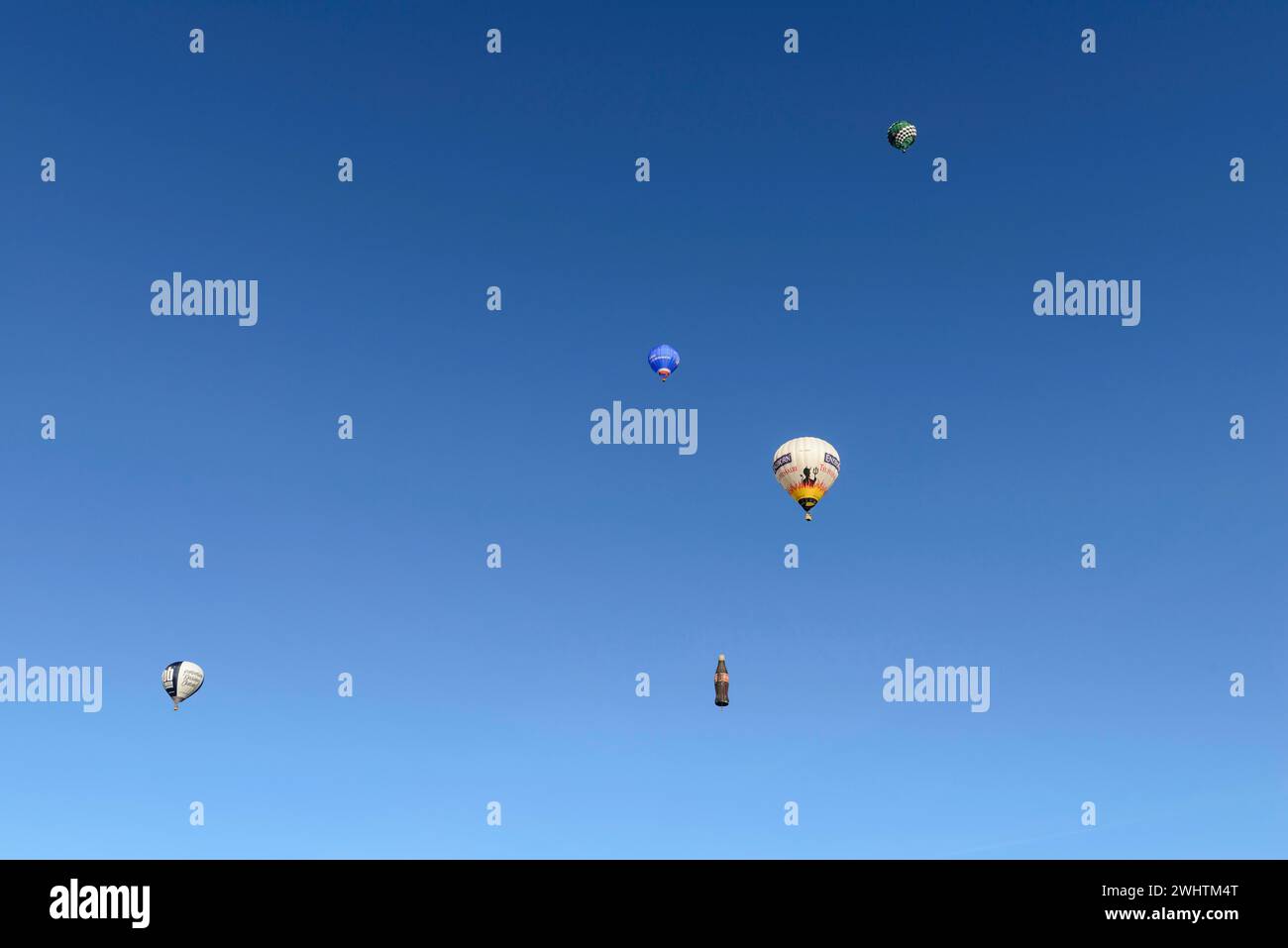 Five hot air balloons in the blue sky, Montgolfiade Tegernseer Tal ...