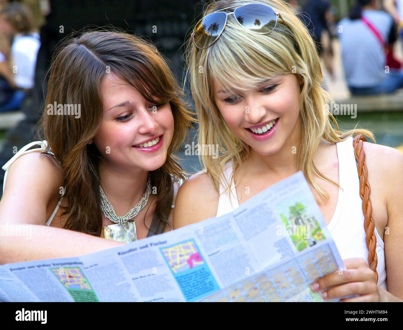 Female visitor reading guide hi-res stock photography and images - Alamy