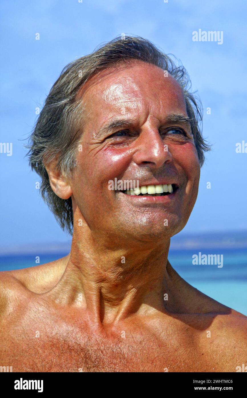 Seniors, Tanned man on the beach of Ibiza, Portrait Stock Photo - Alamy
