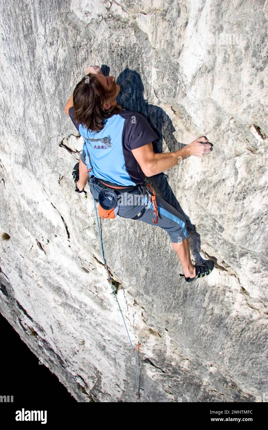 Man climbing on the mountain at Lake Garda, Rope free, Free climbing ...