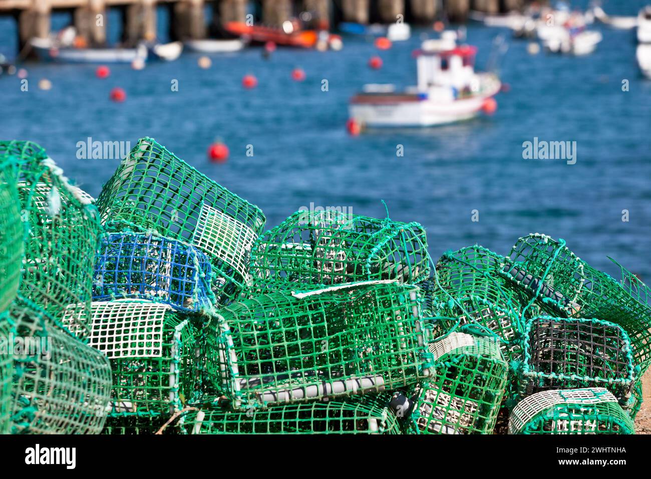 Lobster and Crab traps stack in a port Stock Photo - Alamy