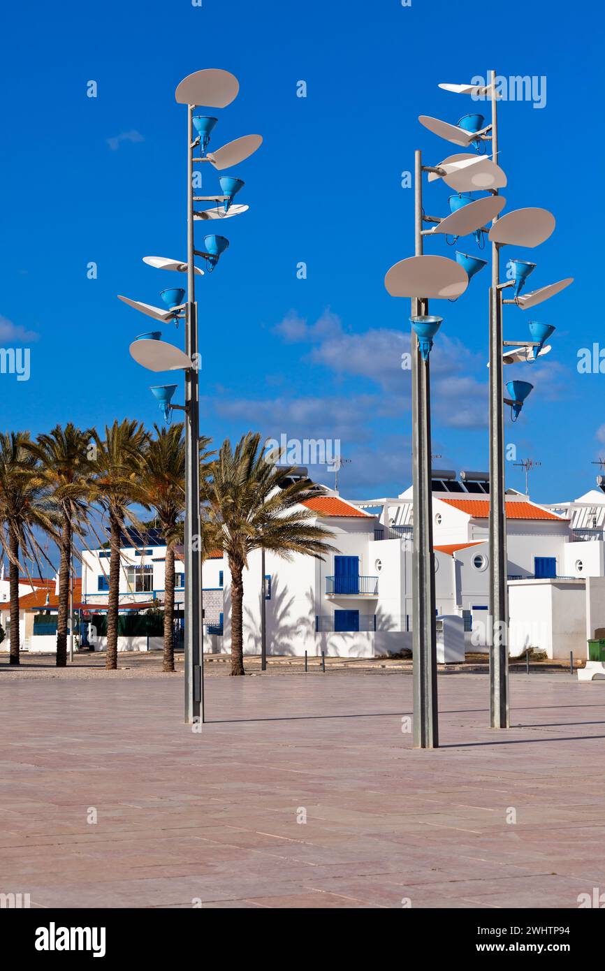 View of town square with modern lamps. Manta Rota, Portugal Stock Photo ...
