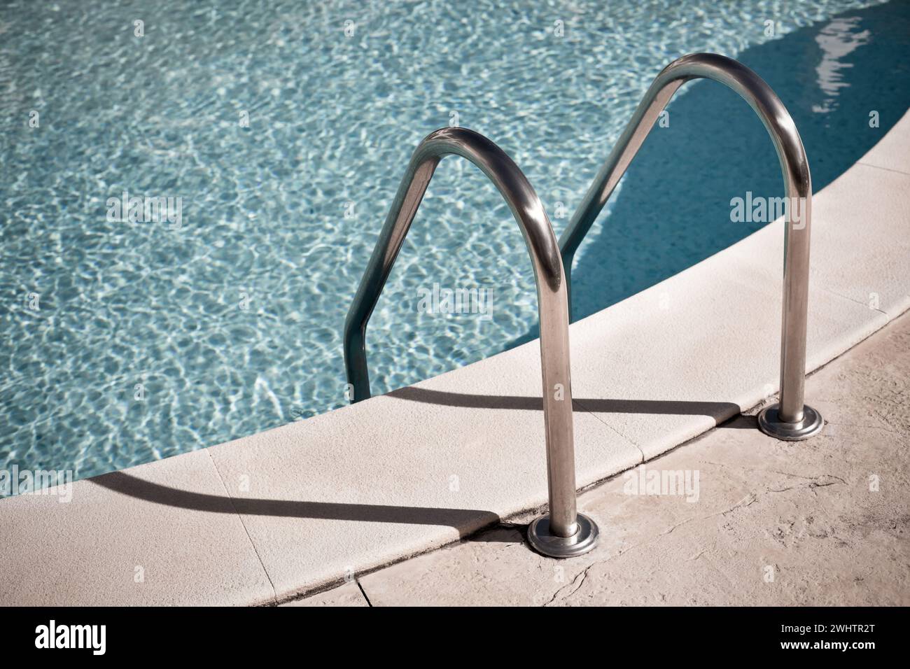 Ladder of a swimming pool Stock Photo - Alamy