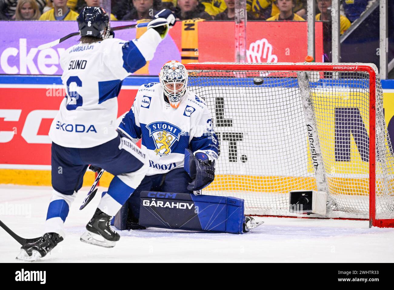 Karlstad, Sweden. 11th Feb, 2024. Finland's Tony Sund and Finland's goalkeeper Emil Larmi during ...