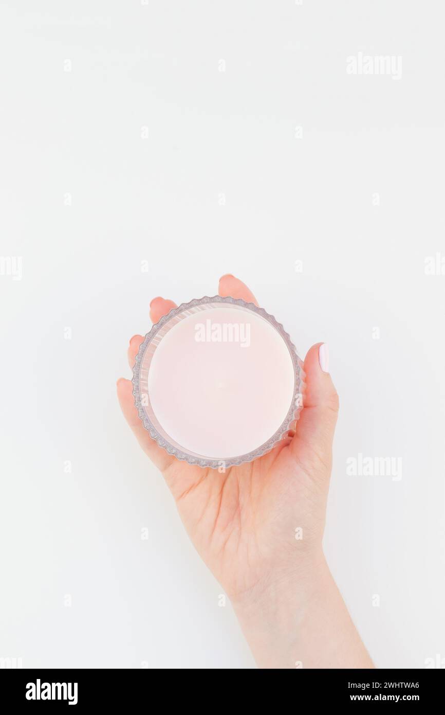 Pink feminine background hand hi-res stock photography and images - Alamy