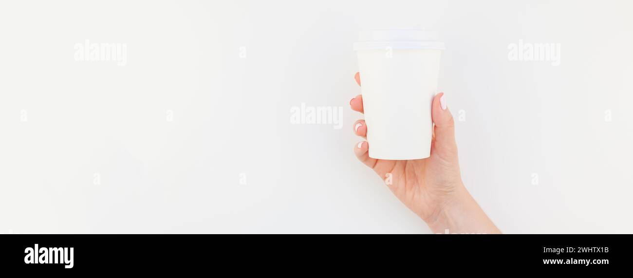 Cup in female hand hi-res stock photography and images - Alamy