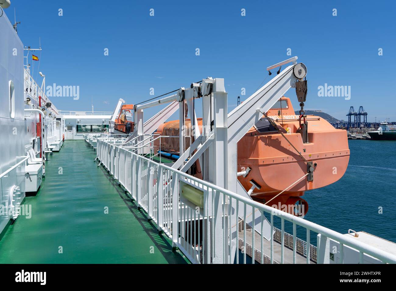 An orange lifeboat raft on a white ferry. High quality photo Stock ...