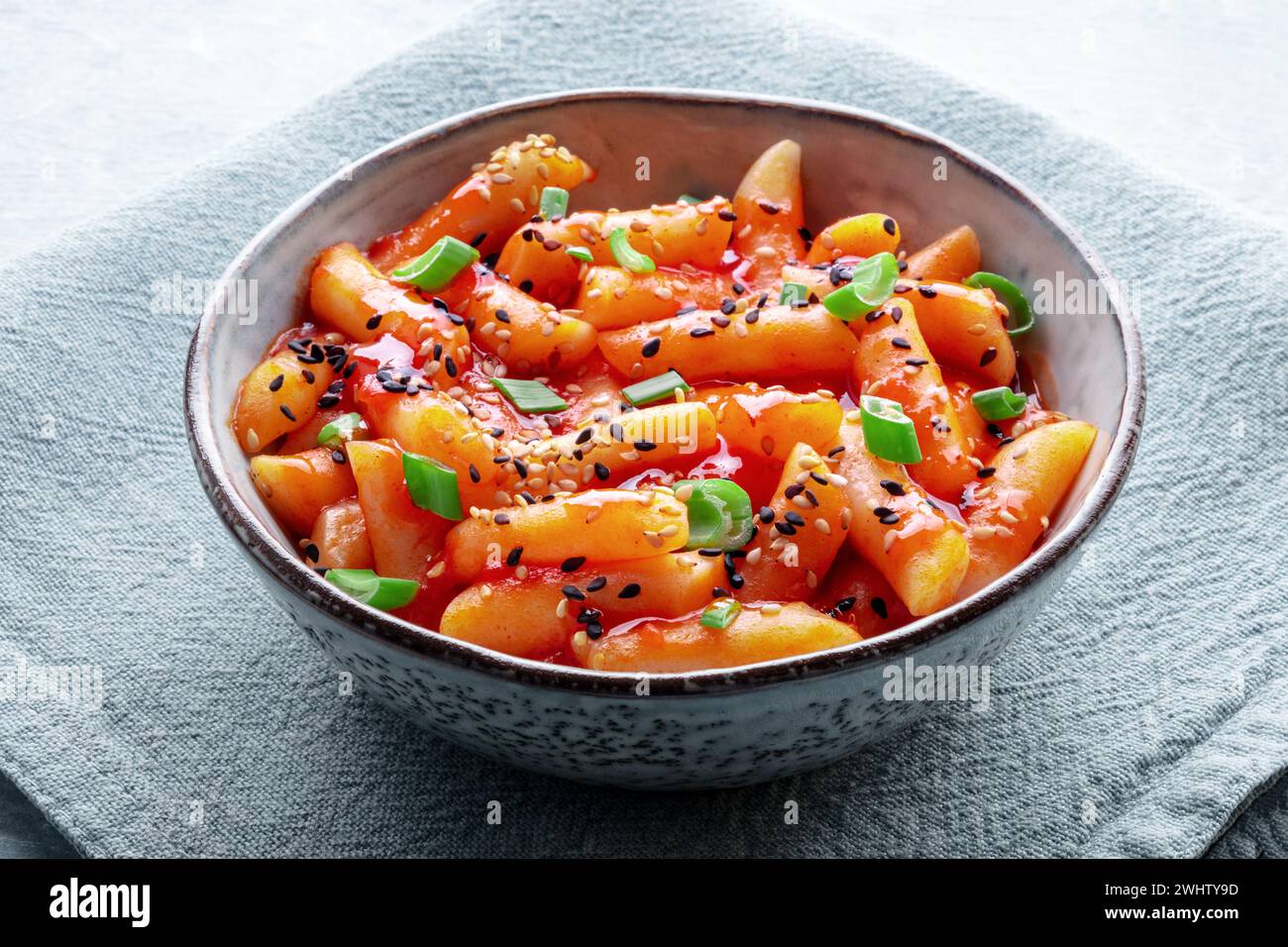 Tteokbokki or topokki, Korean street food, spicy rice cakes Stock Photo ...