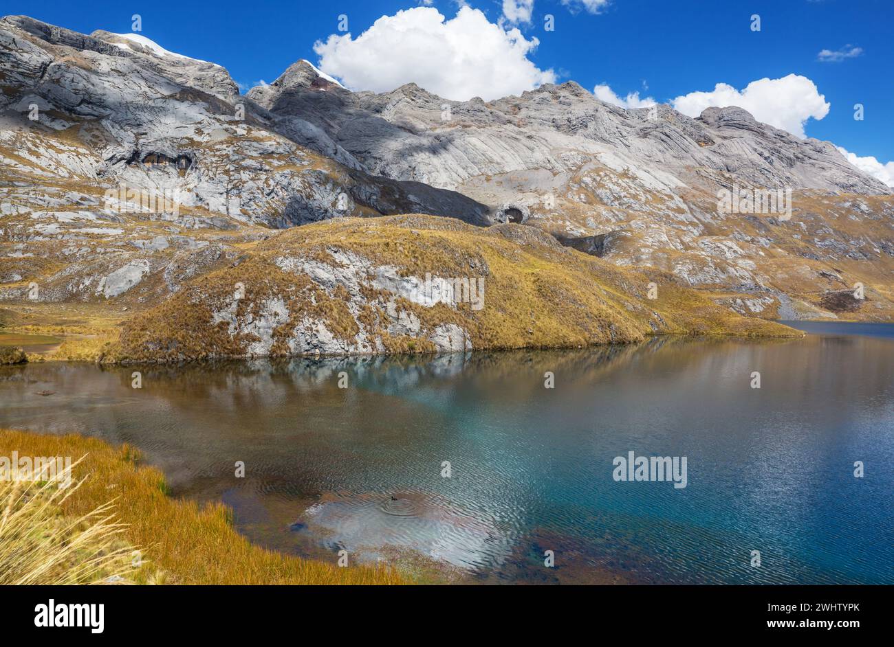 Hiking in the fantastic landscape of the Peruvian high mountain Andes ...
